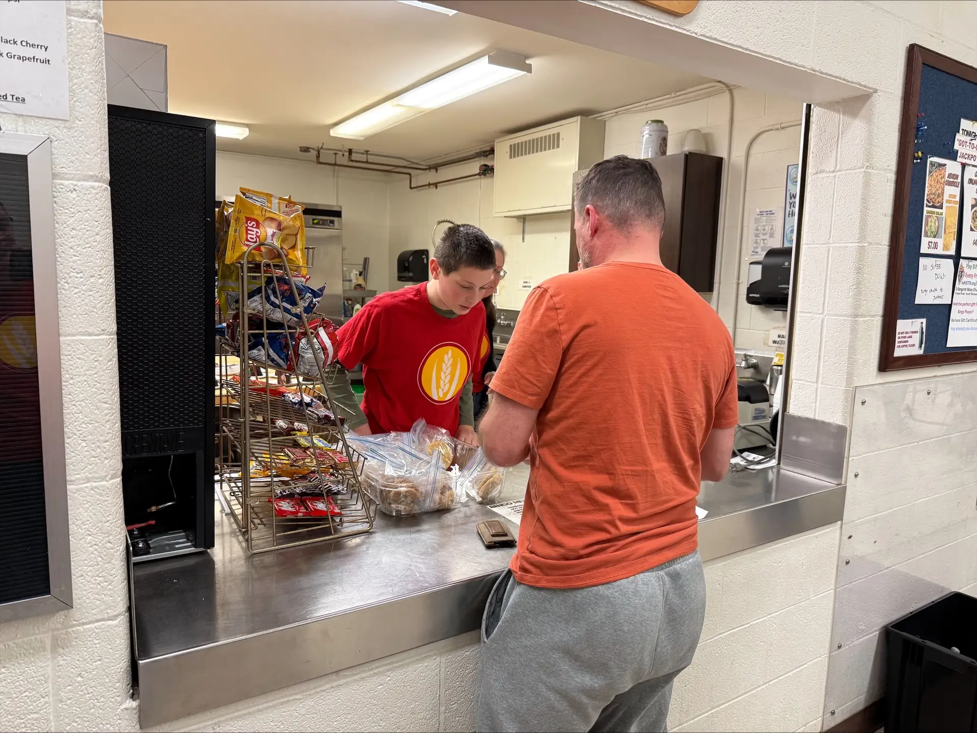 Grandmother and Grandson Volunteer Together at Midwest Food Bank